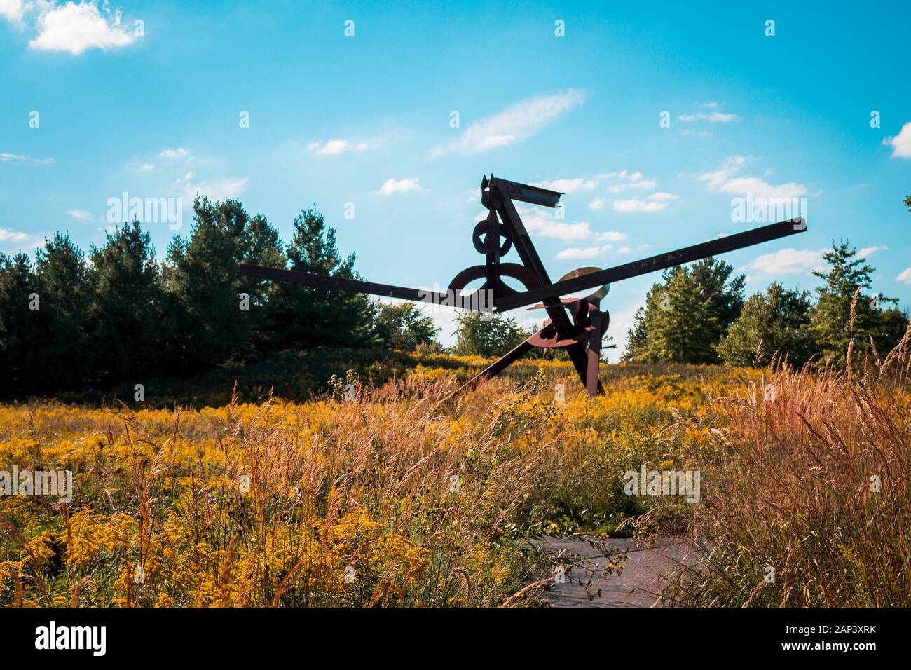 Large steel beam statue in a field at the Frederik Meijer Gardens in ...