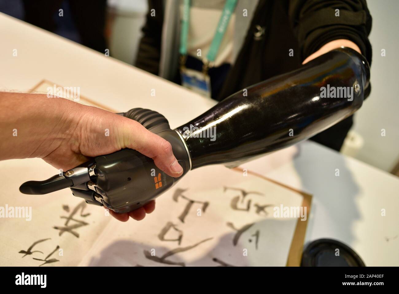 BrainCo prosthetic arm and hand using artificial intelligence and ...