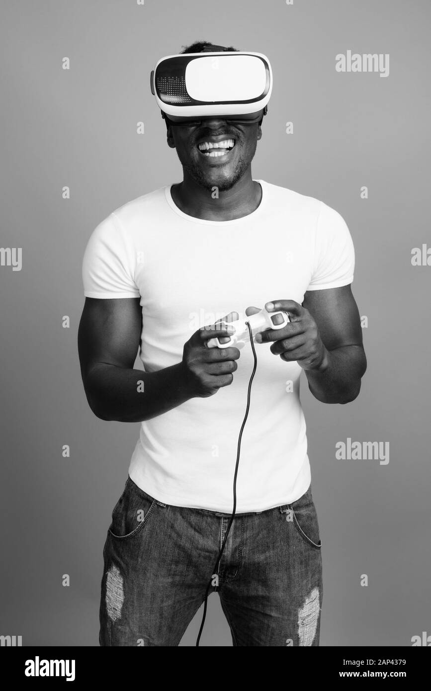 Young man playing vr Black and White Stock Photos & Images - Alamy