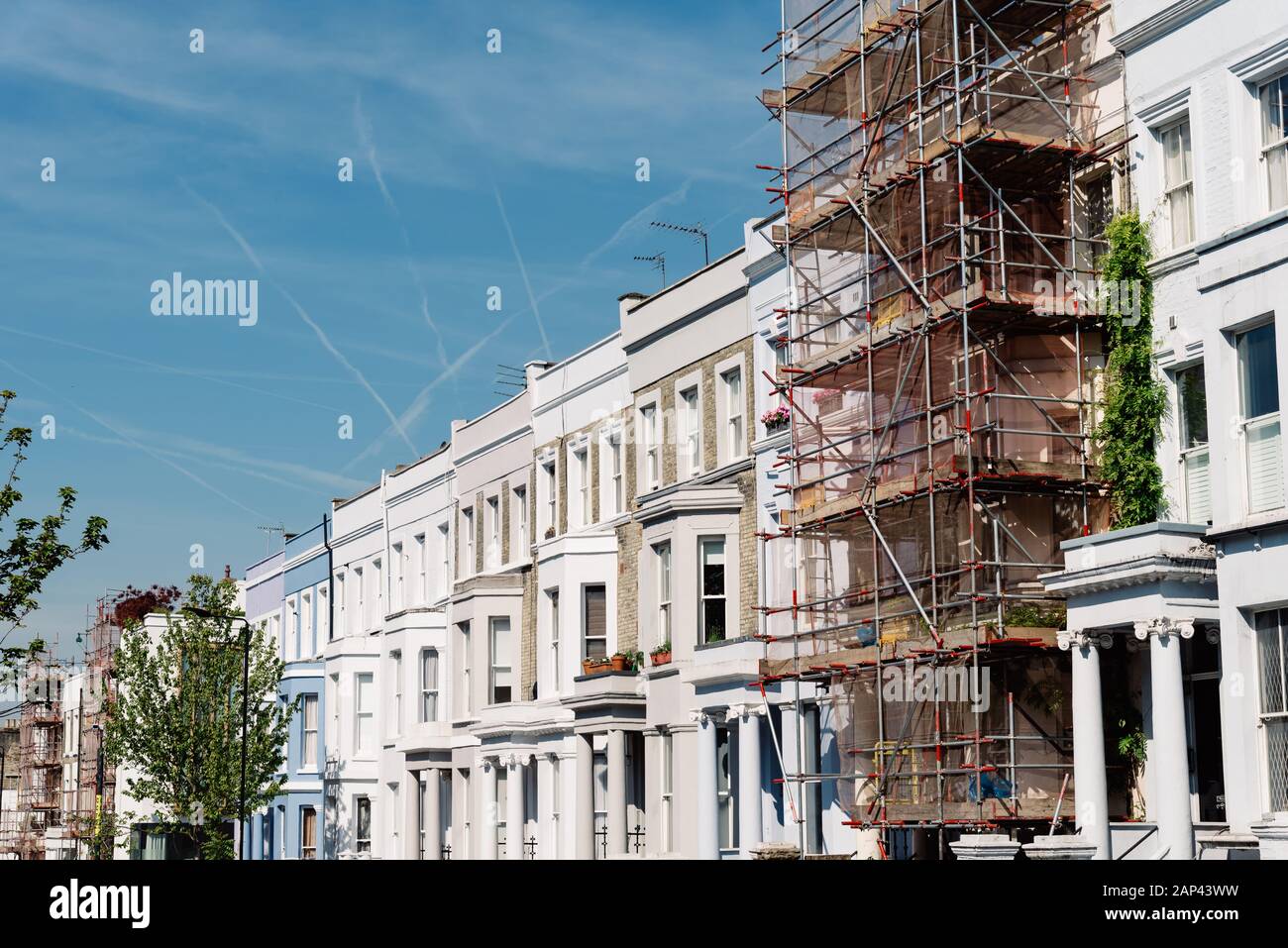 Traditional townhouses in Notting Hill, one of which is being renovated ...