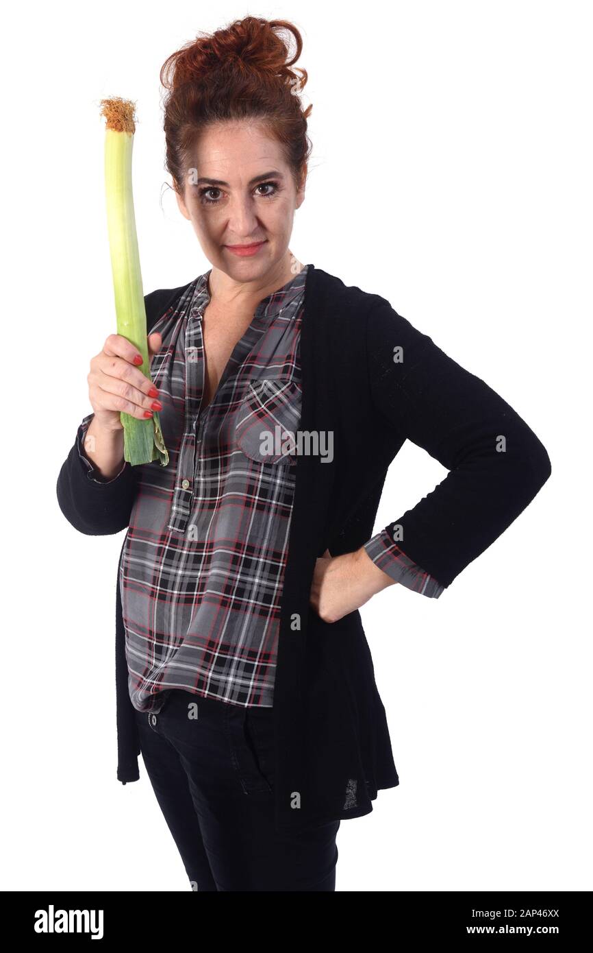 portrait of a woman with leek on white background Stock Photo - Alamy