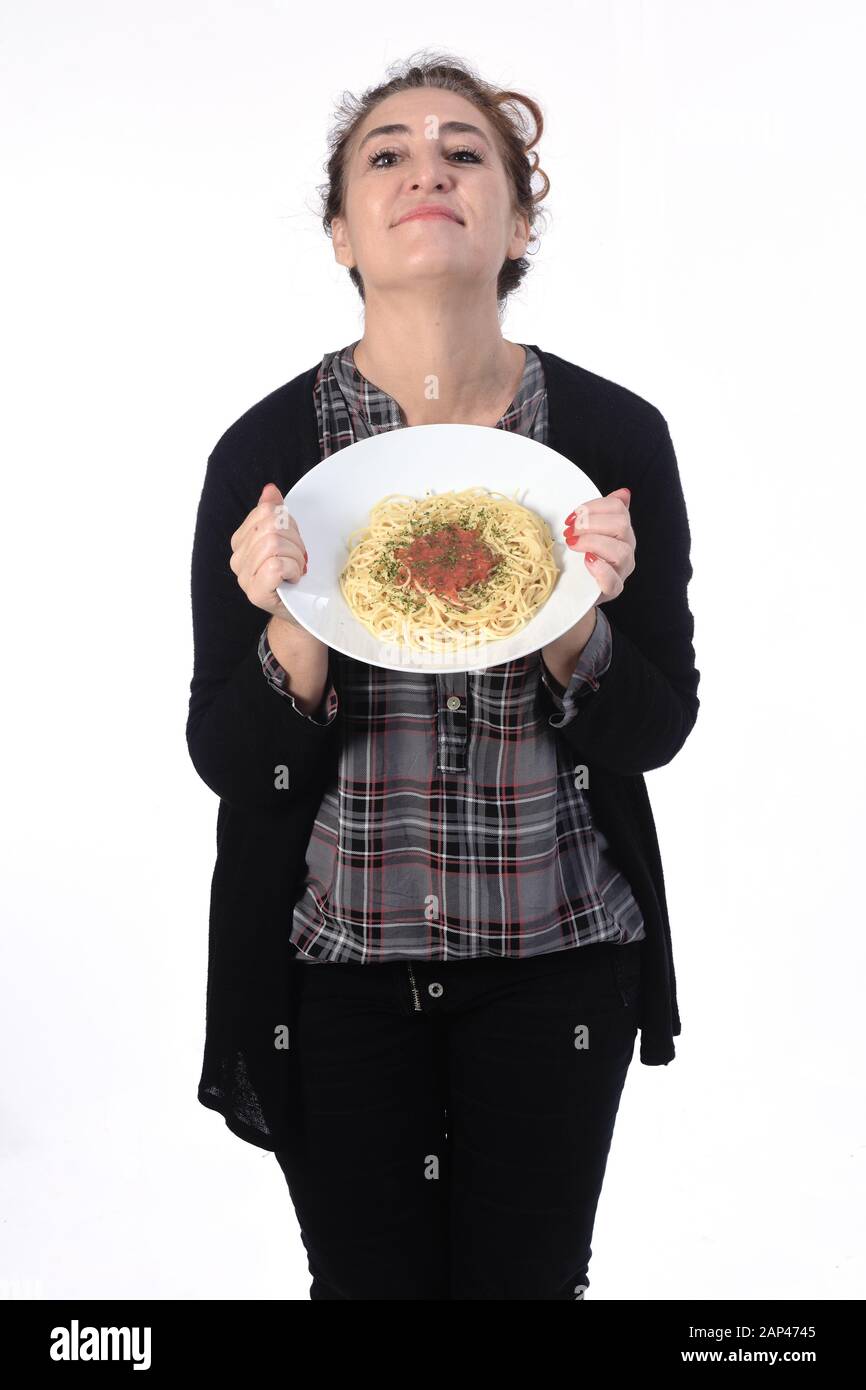 woman with spaghetti on white background Stock Photo - Alamy