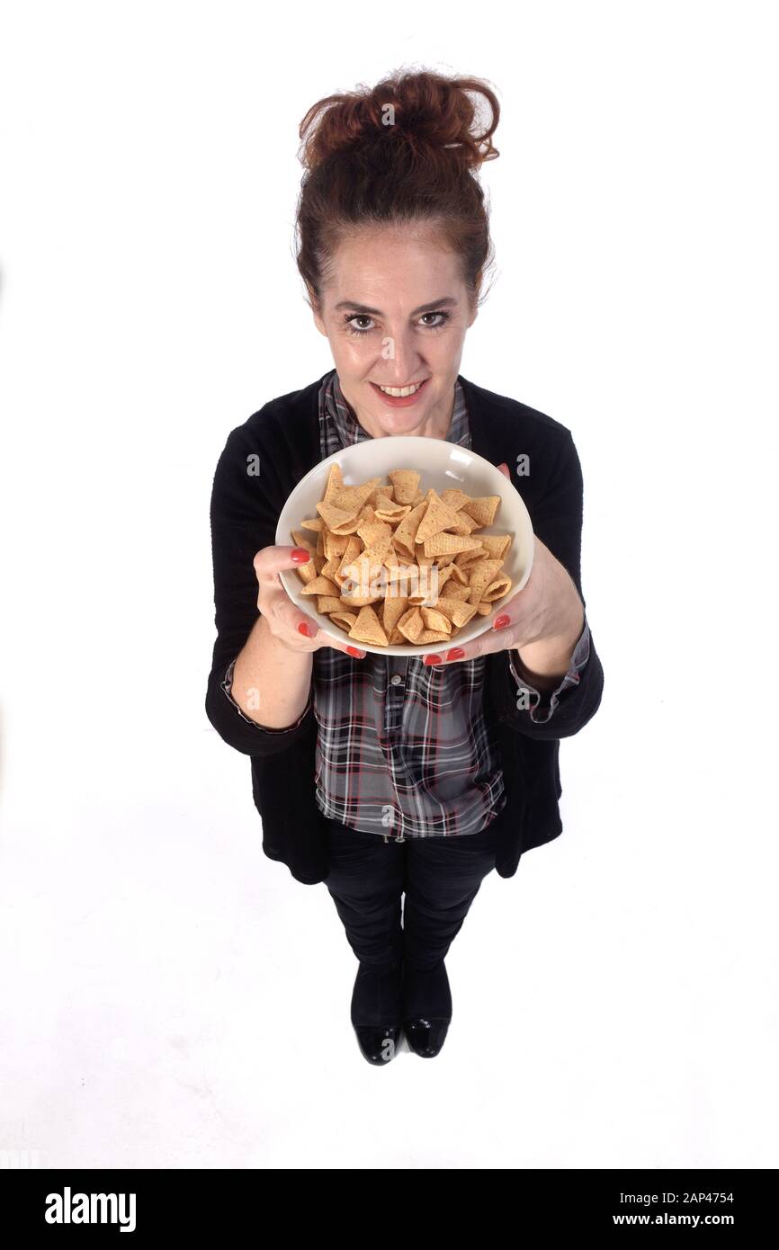 woman with snacks on white backgrund Stock Photo - Alamy