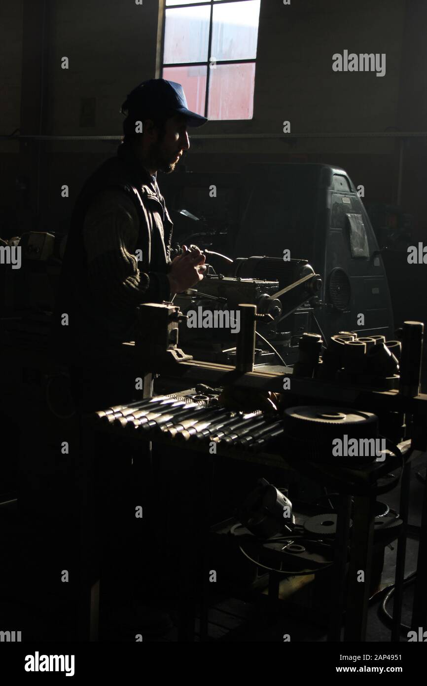 worker working inside the factory Stock Photo - Alamy