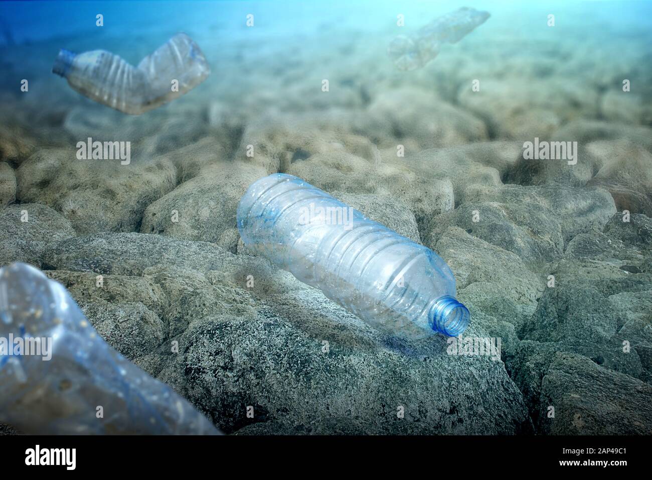 Underwater view with a plastic bottle on the ocean. Plastic pollution ...