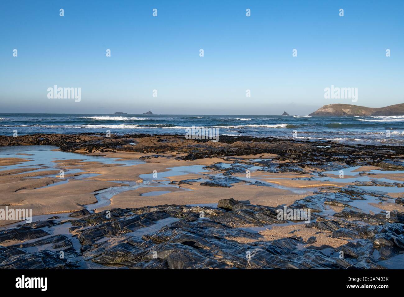 looking out across beach and rocks at Constantine Bay to Trevose Head ...