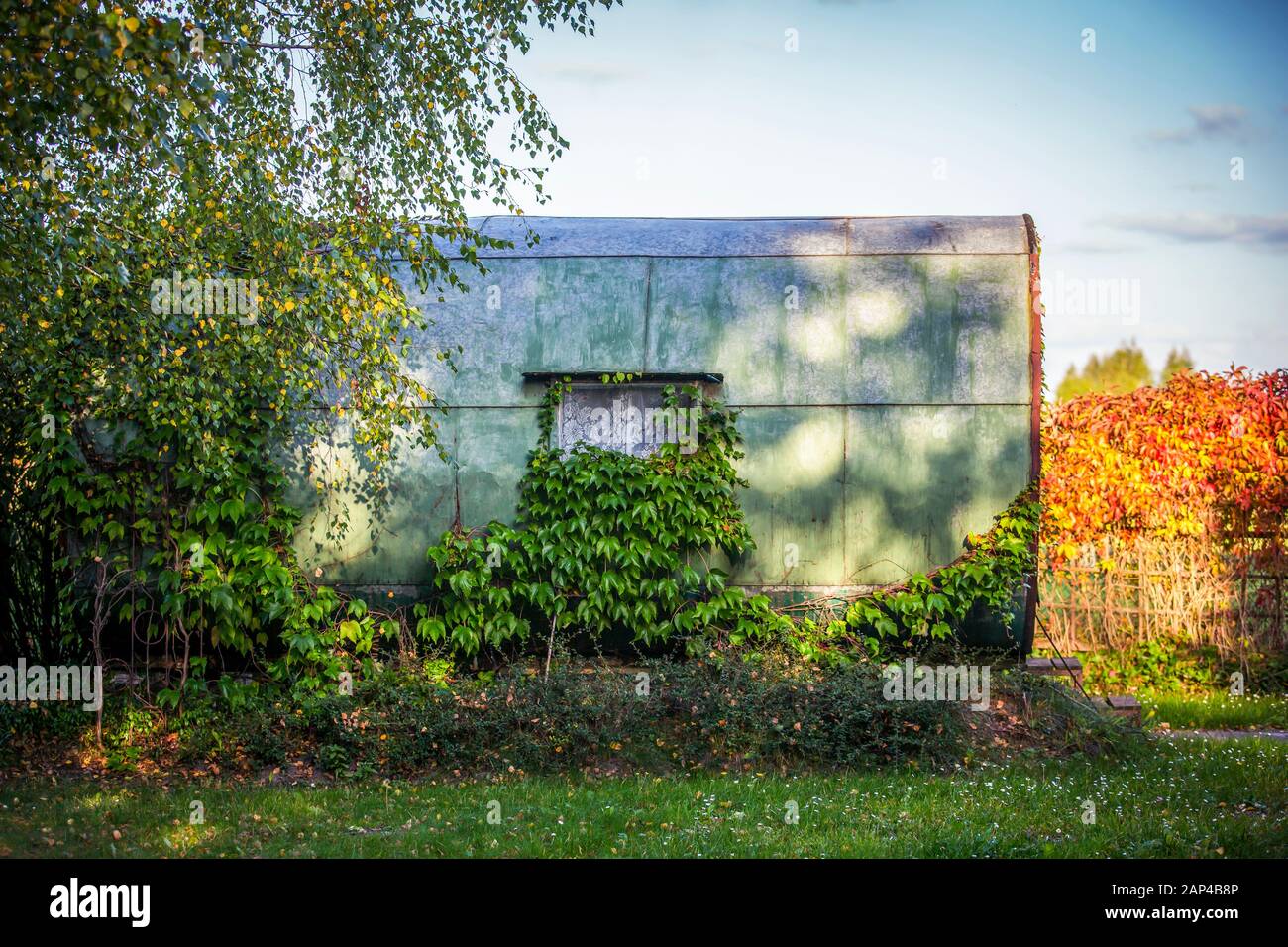 A small eco house made from recycled materials Stock Photo - Alamy