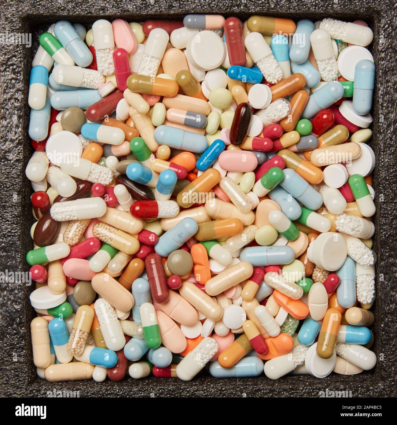Medicine background with lots of colorful medicines drugs from above ...
