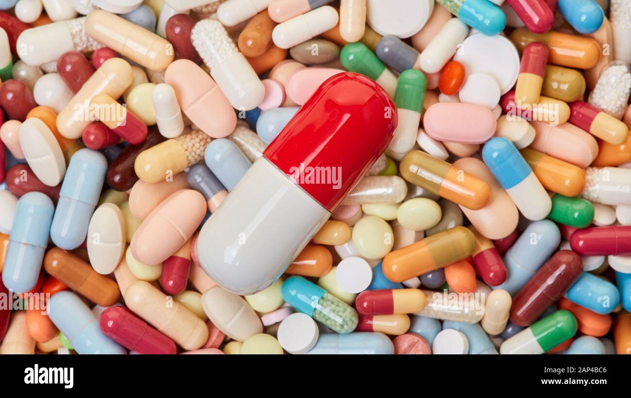 Colorful medication header background with big pill Stock Photo - Alamy