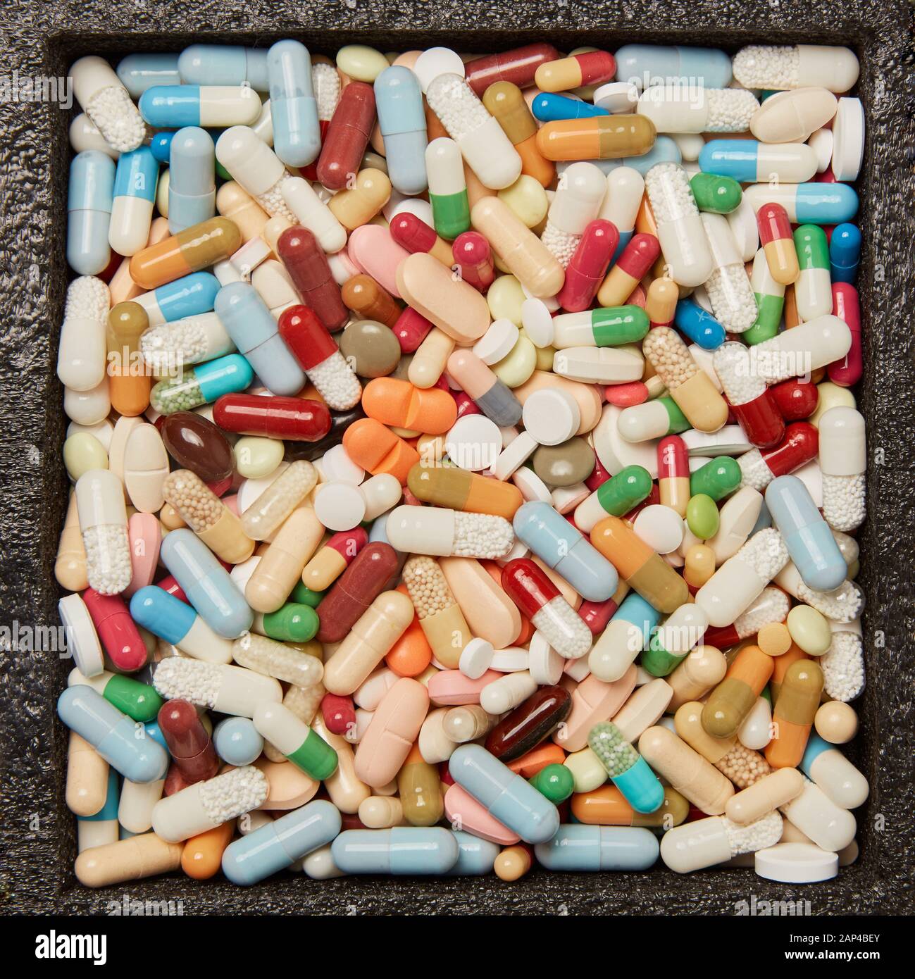 Lots of colorful medicines drugs and pills from above Stock Photo - Alamy
