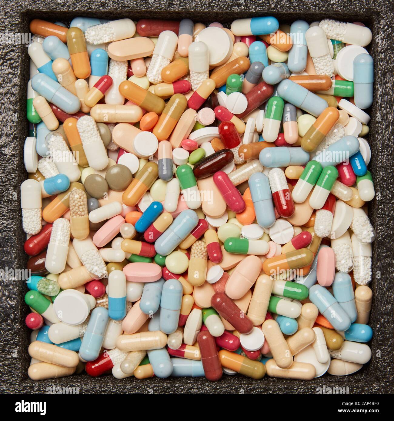 Lots of colorful medicines drugs from above Stock Photo - Alamy
