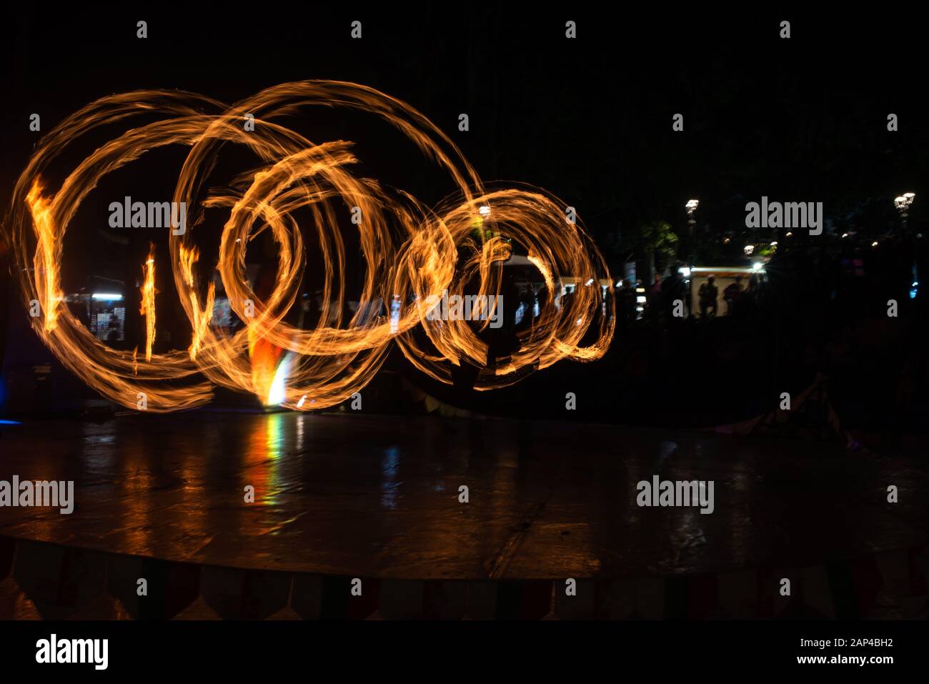 Fire Show Flaming Trails on stage slow shutter exciting event concept ...