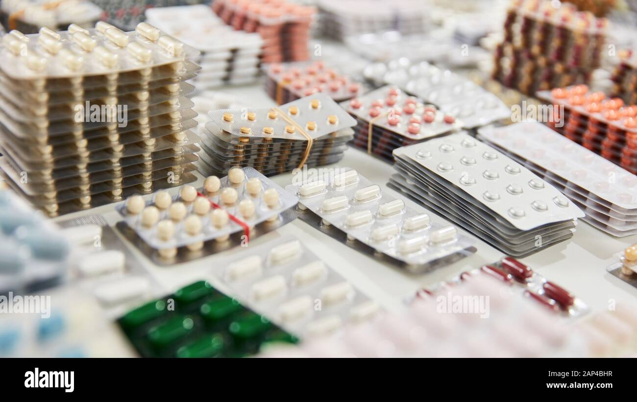 Many assorted medicines drugs and tablets and pills in a pharmacy Stock ...