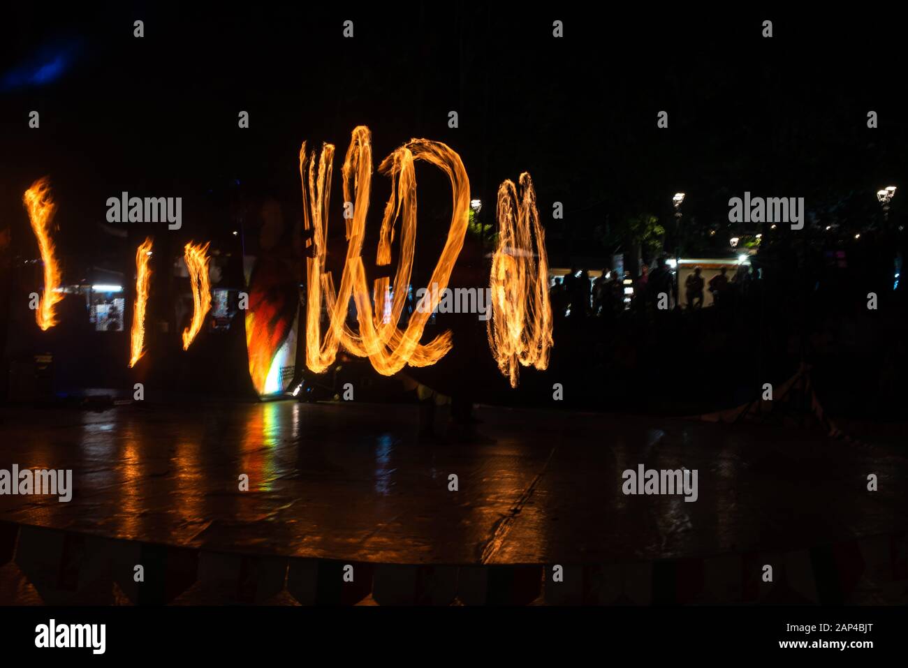 Fire Show Flaming Trails on stage slow shutter exciting event concept ...