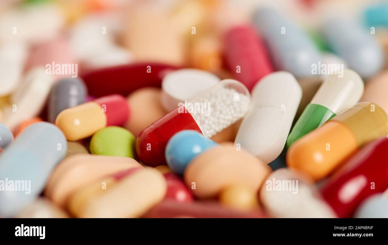 Many different colorful tablets, pills, medicines drugs Stock Photo - Alamy