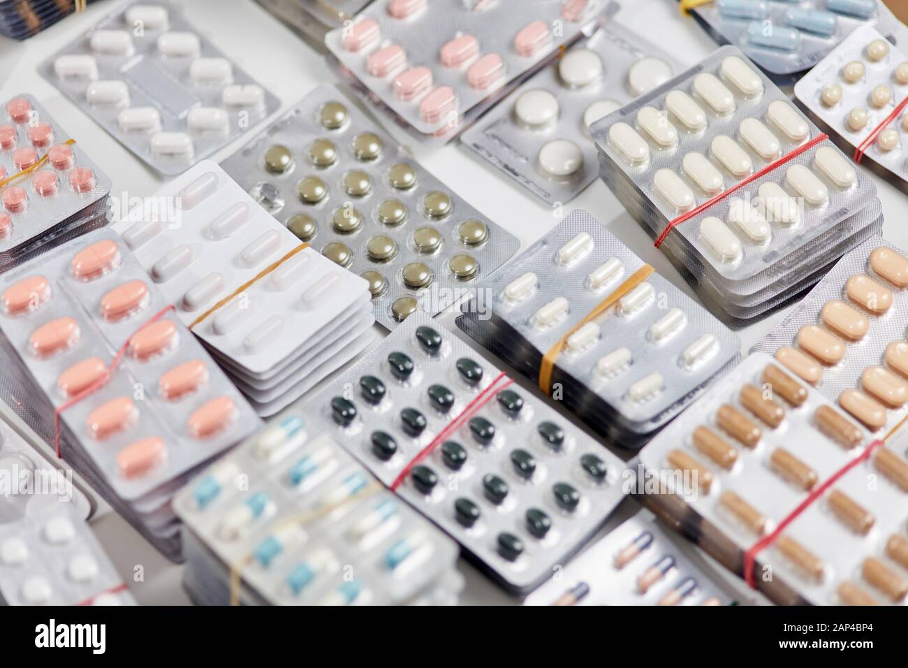 Many assorted medicines drugs in pharmacy as healthcare background ...