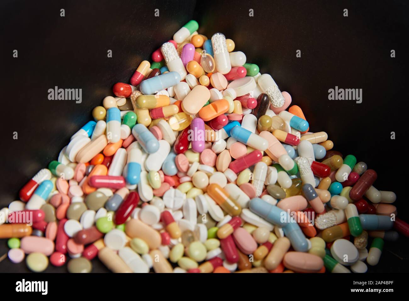 Colorful medicines drugs arranged as a pyramid Stock Photo - Alamy