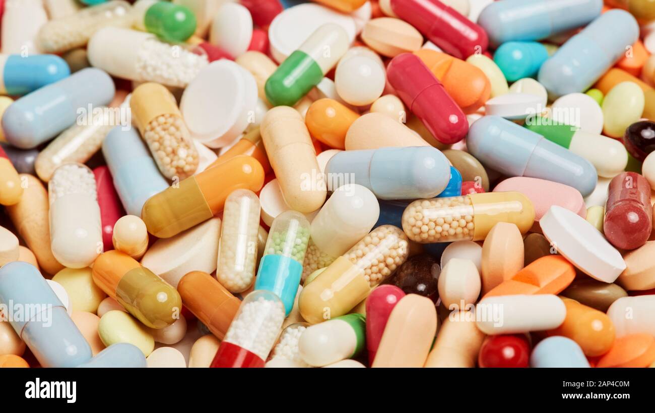 Health concept with lots of colorful medication Stock Photo - Alamy