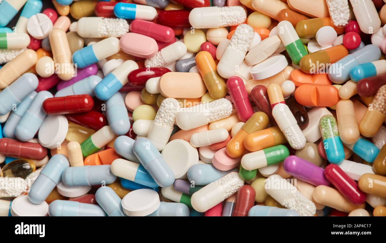 Pharmacy with lots of colorful medicines drugs and pills Stock Photo ...