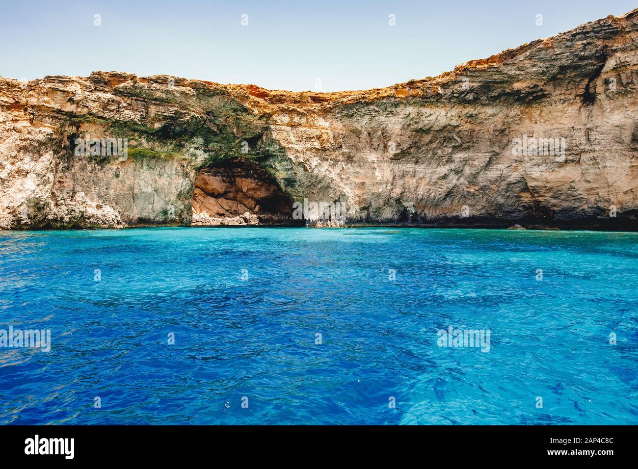 Panorama beach Blue Lagoon Comino Malta. Rocky coast with window and ...