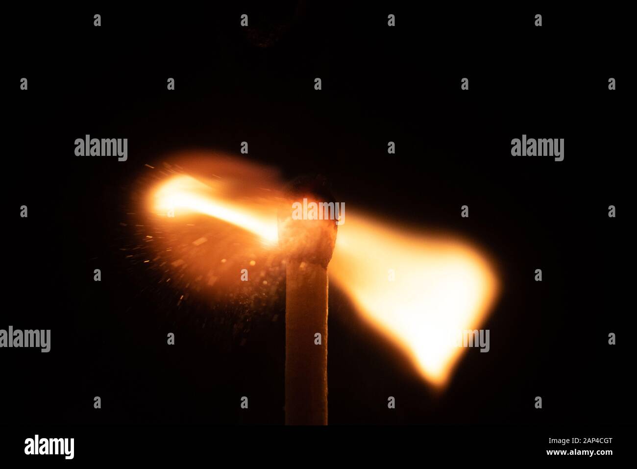 Ignition of match with sparks isolated on black background space for ...