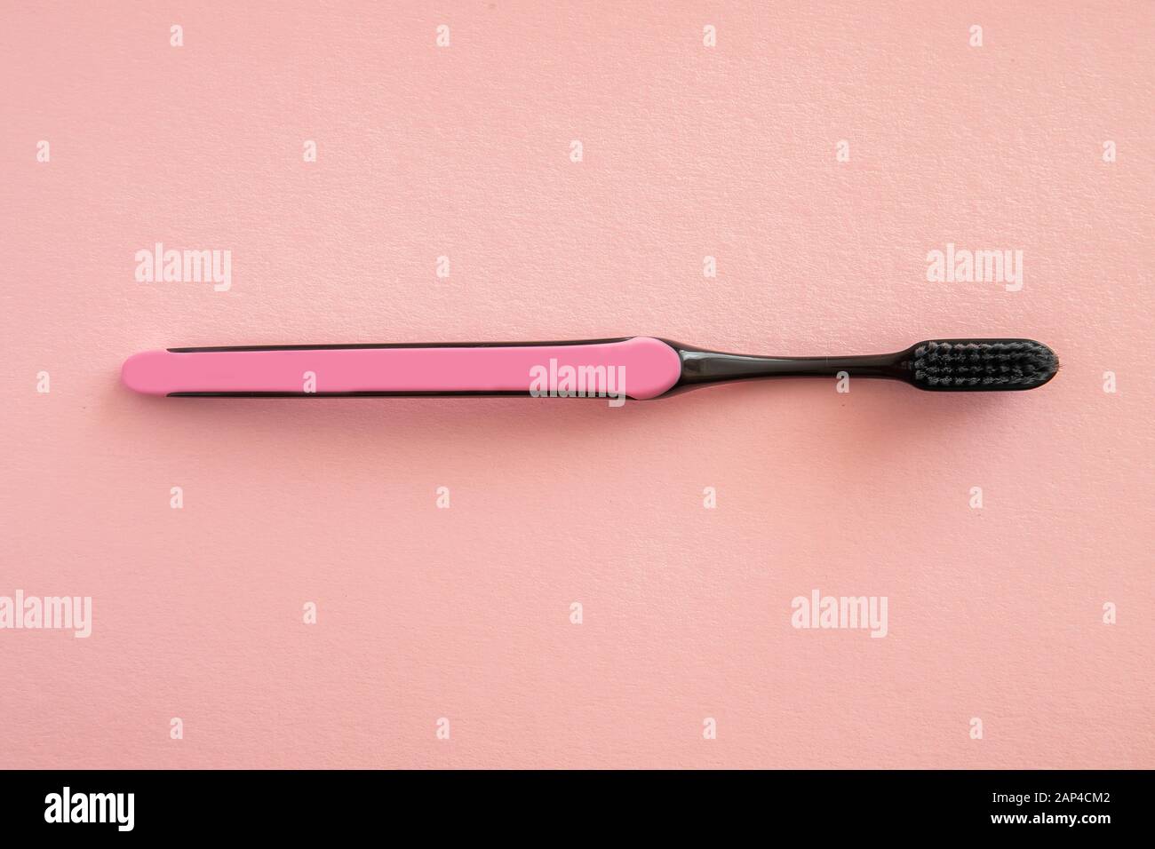 Toothbrush for brushing teeth on pink background, pastel colors Stock ...