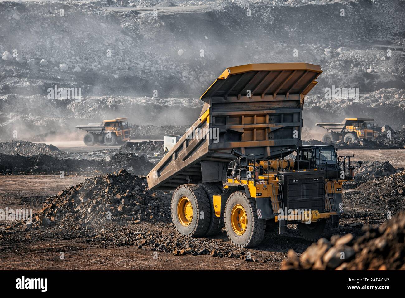 Big yellow mining truck laden anthracite moves open pit coal mine Stock ...