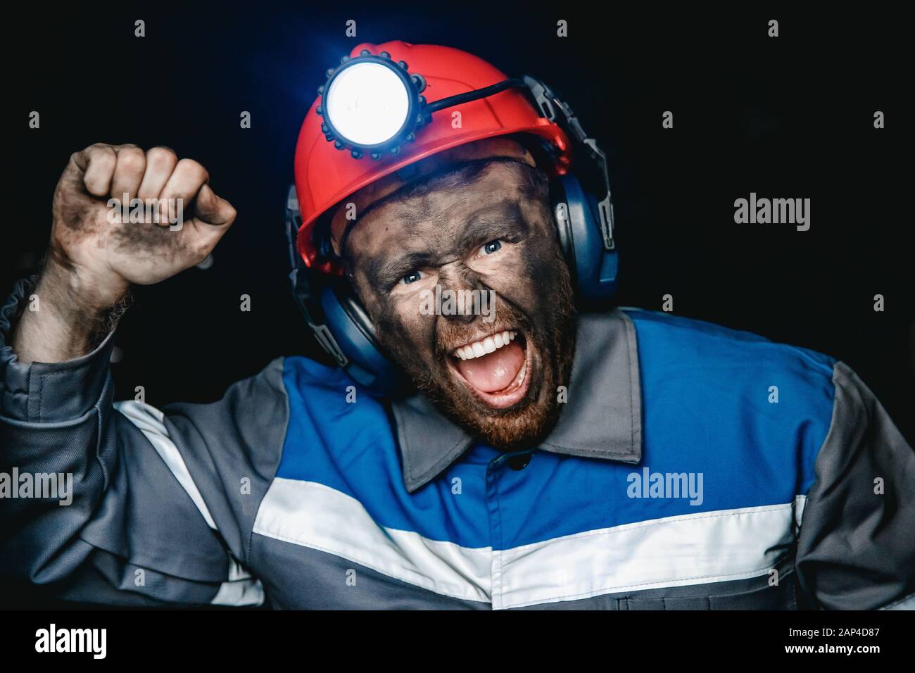 Miner man hands protest fist up revolution coal mine. Concept workers ...
