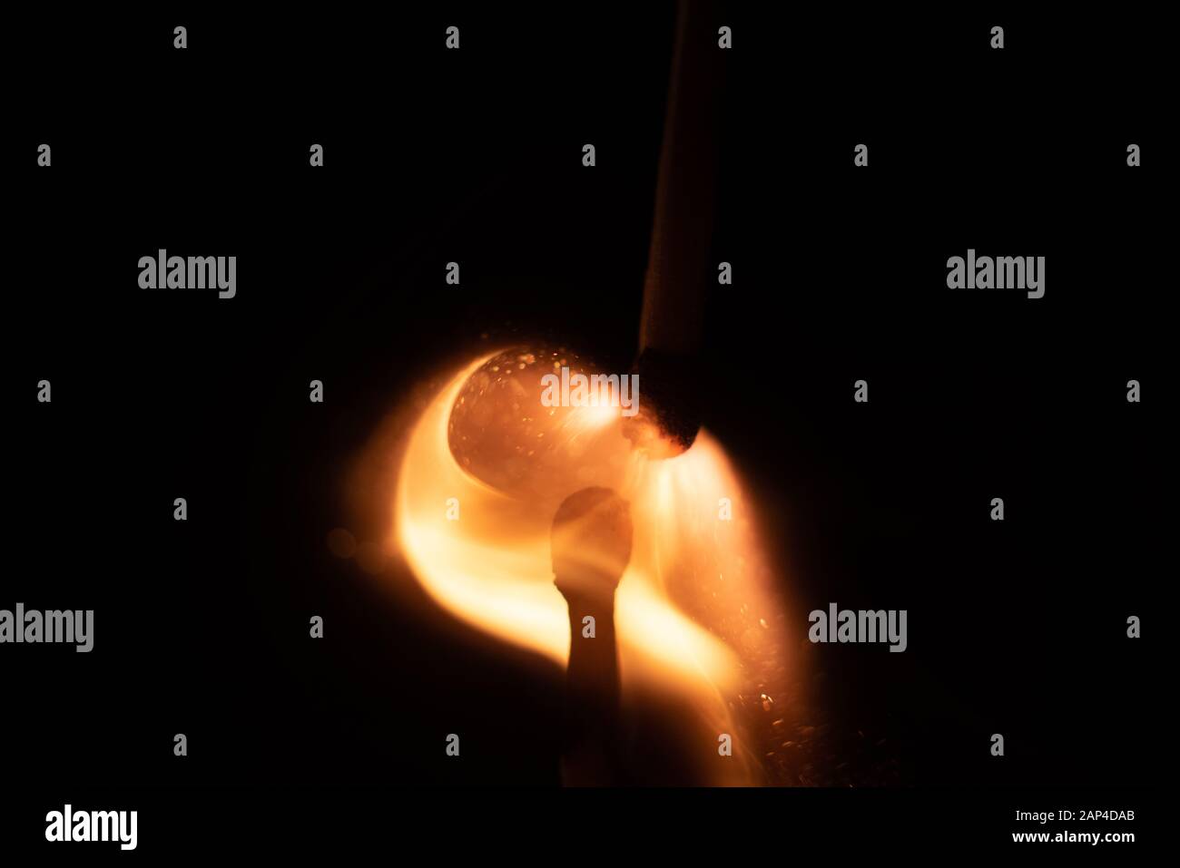 Ignition of match with sparks isolated on black background space for ...