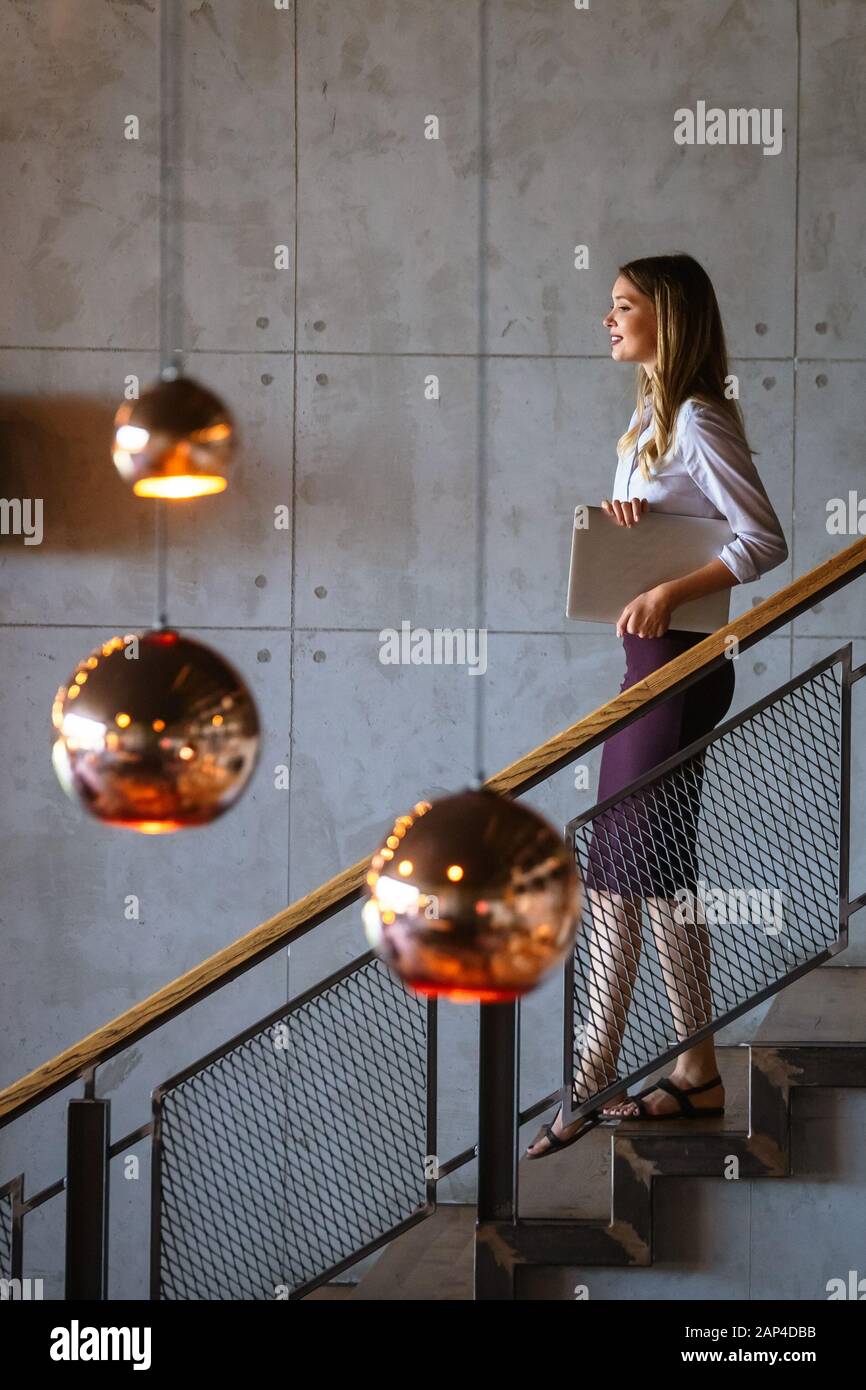 Beautiful executive business woman, ceo, coworker at the workspace ...