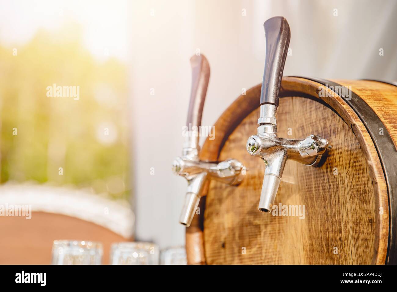 Draft beer in wooden keg for summer party in yard. Food catering ...