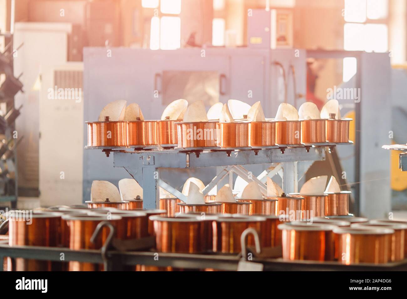 Production of copper wire, bronze cable in reels at factory Stock Photo ...