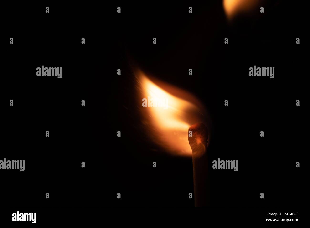 Ignition of match with sparks isolated on black background space for ...