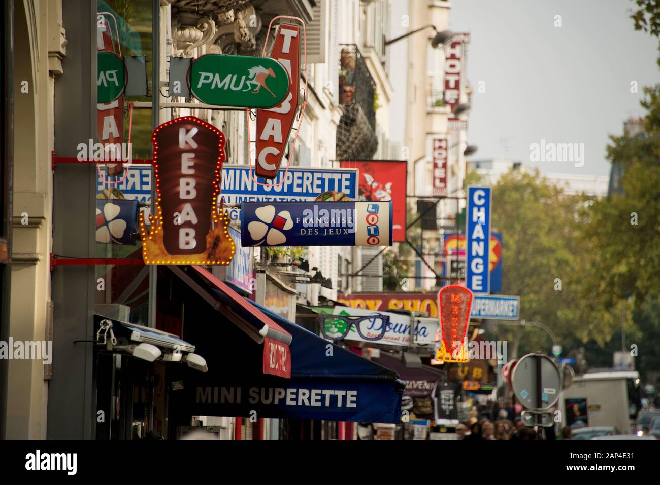 Shop Signs in Pigalle District Paris Frances taken during day. Red ...