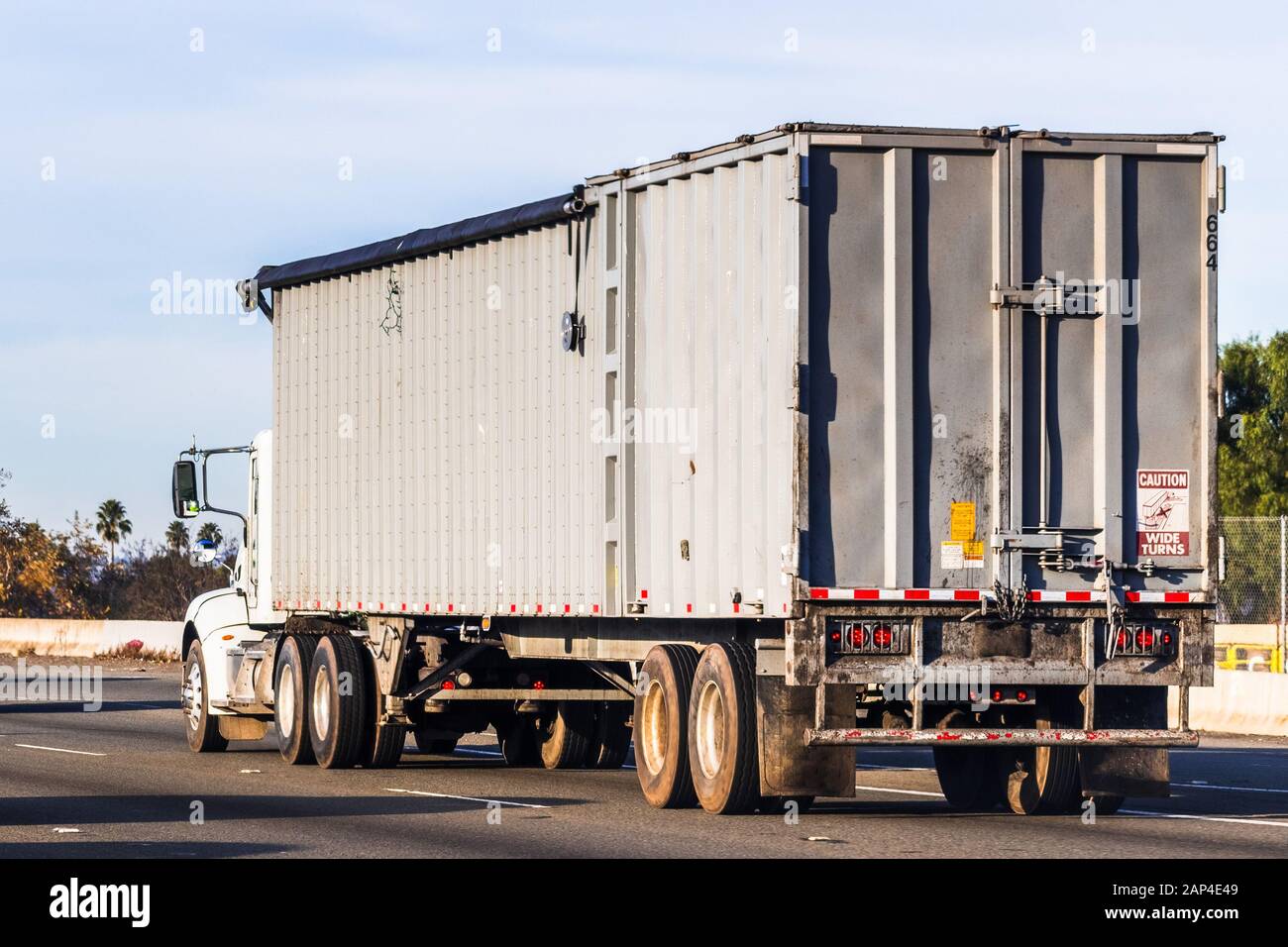 Truck driving on the freeway, California Stock Photo - Alamy
