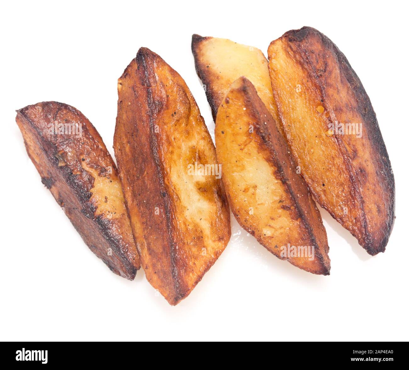 Fried potato wedges isolated on white background Stock Photo - Alamy