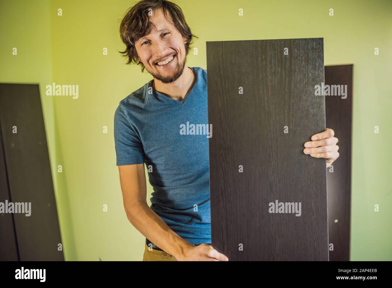 Self assembly furniture smiling hi-res stock photography and images - Alamy