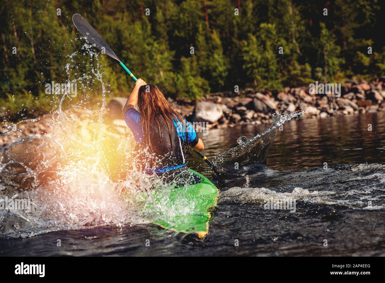 Kayaking on river summer leisure day, boat movement canoe trip. Splash ...