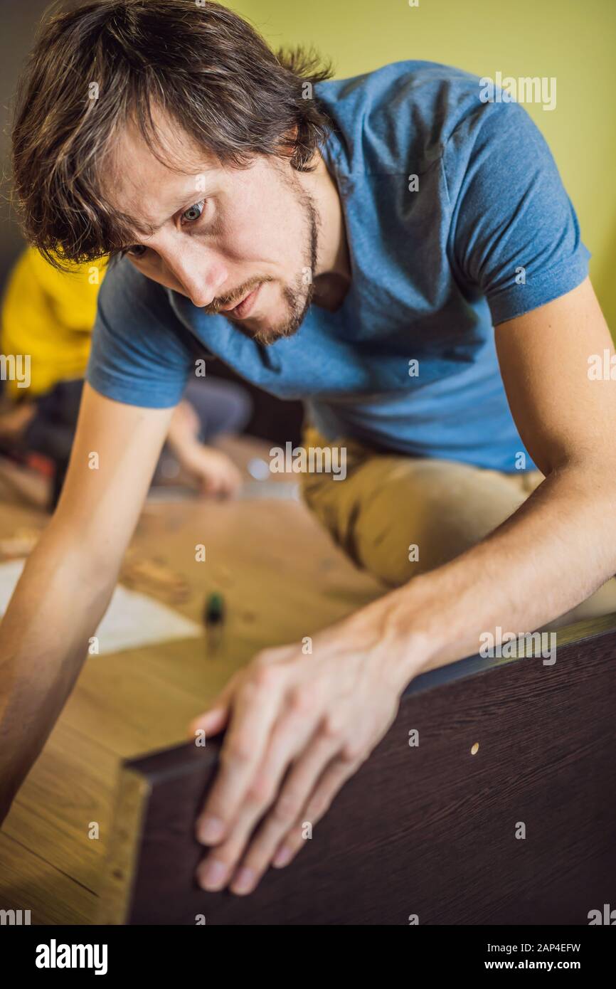 Putting Together Furniture High Resolution Stock Photography and Images ...