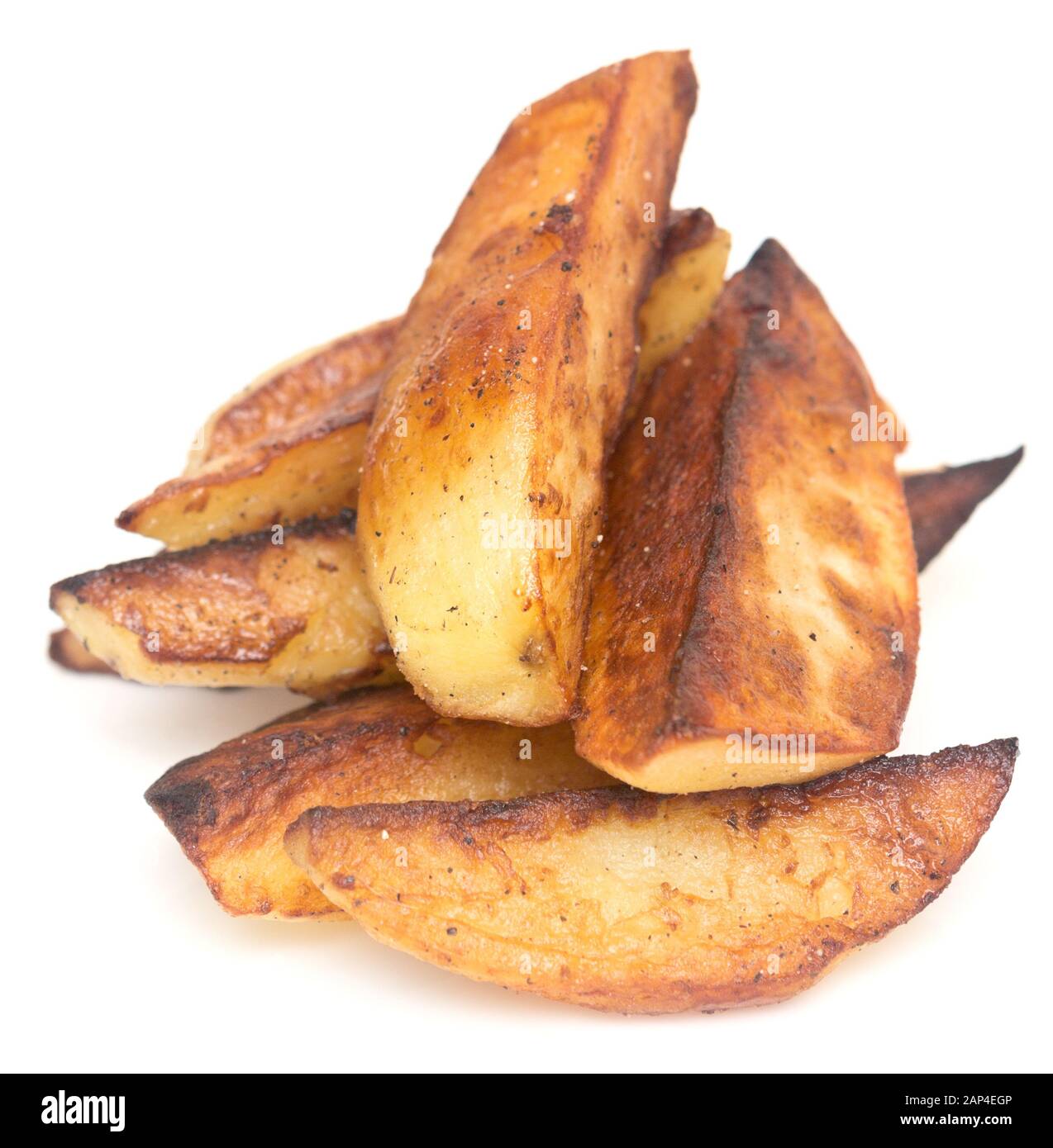 Fried potato wedges isolated on white background Stock Photo - Alamy