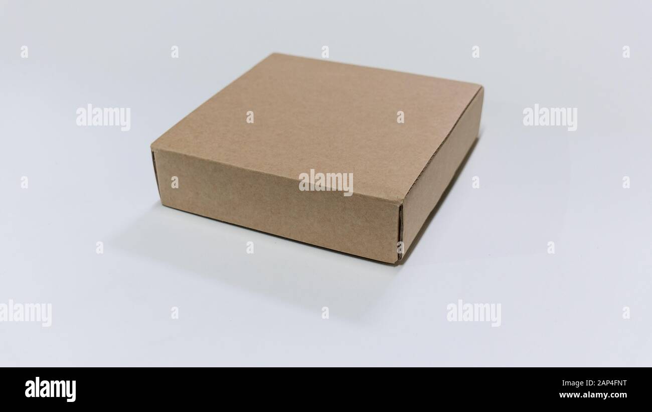 Cardboard box. Side View. With shadows and isolated on white Stock ...