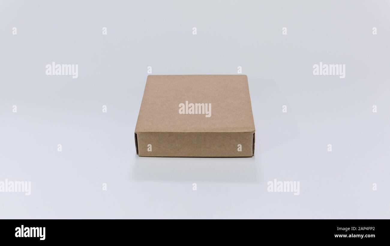 Cardboard box. Front View. With shadows and isolated on white Stock ...