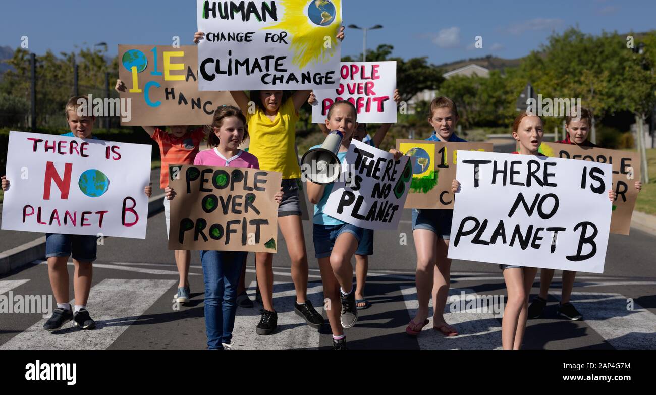 Group of elementary school pupils walking on a protest march Stock ...