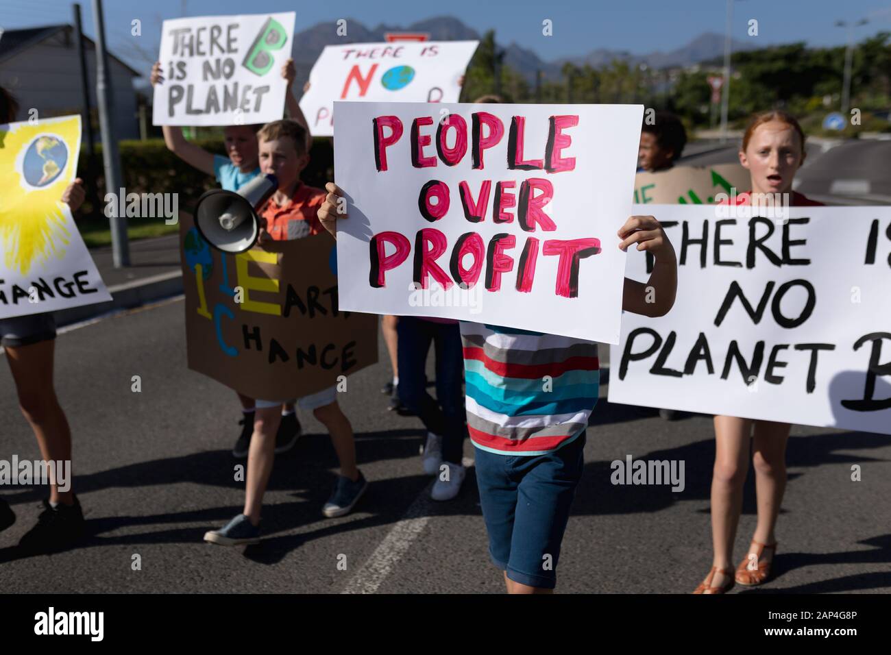 Group of elementary school pupils walking on a protest march Stock ...