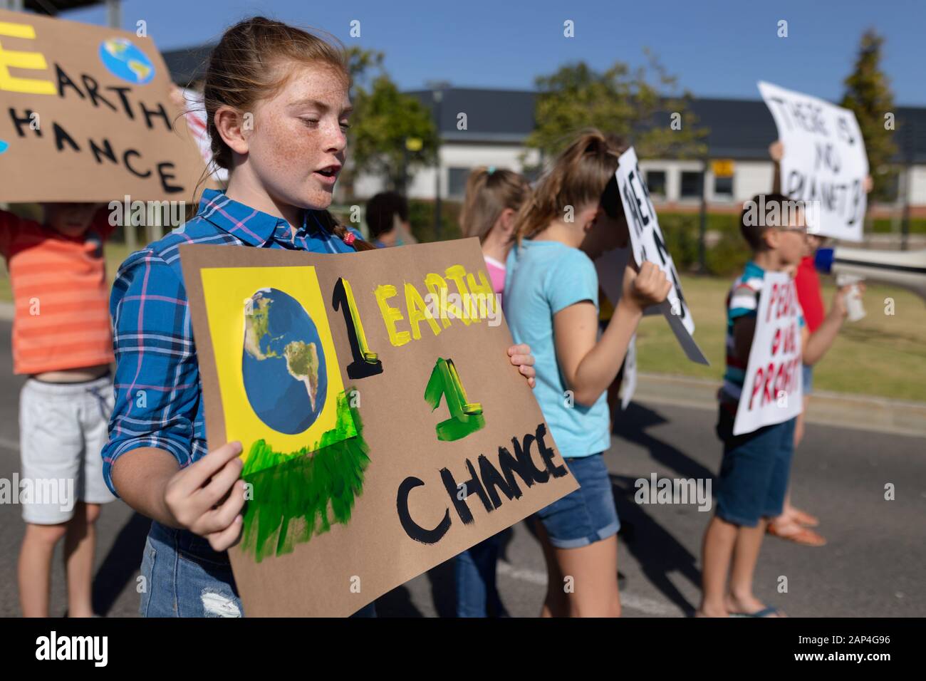 Group of elementary school pupils walking on a protest march Stock ...