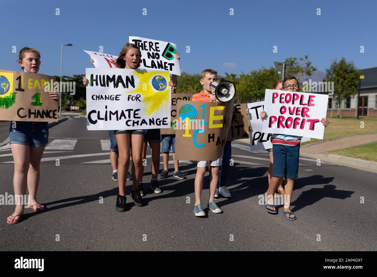Group of elementary school pupils walking on a protest march Stock ...