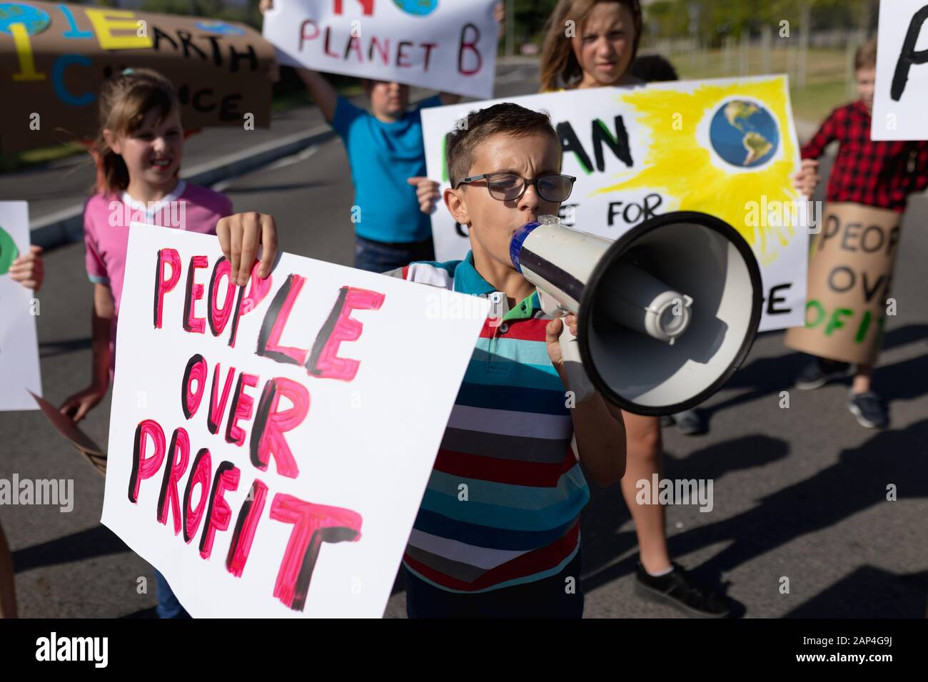 Group of elementary school pupils walking on a protest march Stock ...