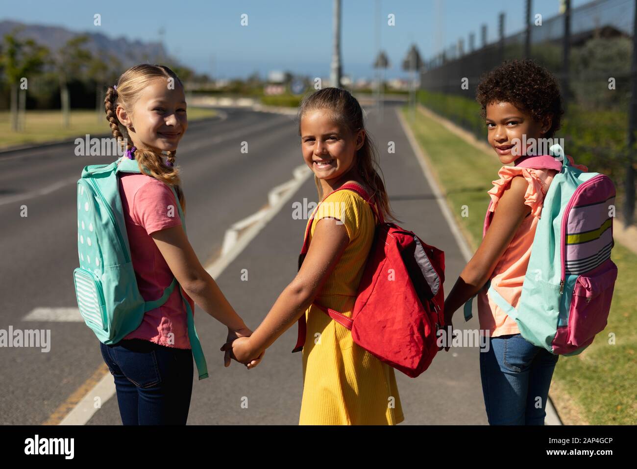 Schoolgirls walking hi-res stock photography and images - Alamy