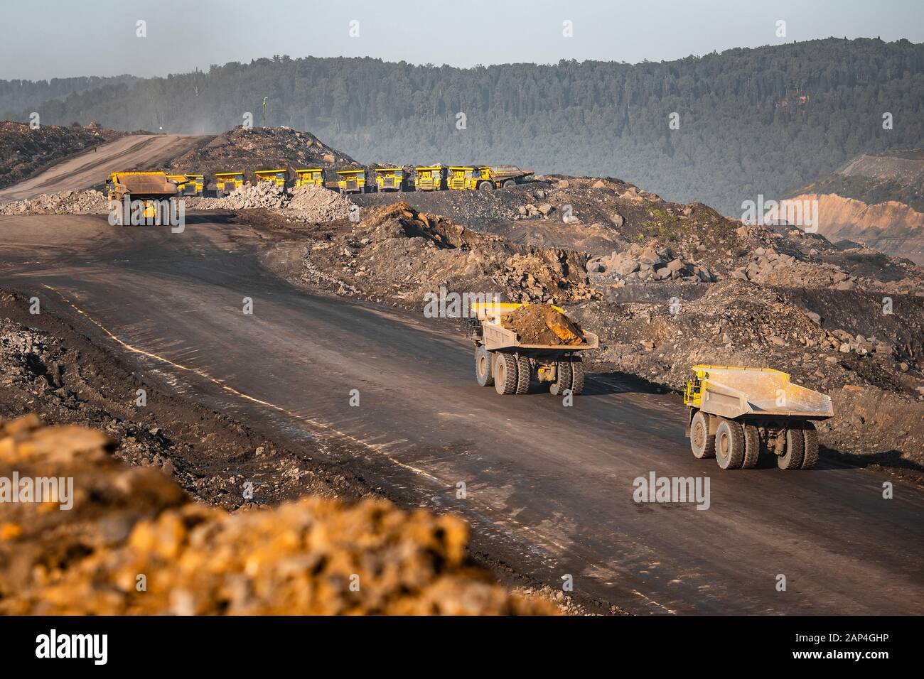 Big yellow mining truck for anthracite. Open pit mine, extractive ...