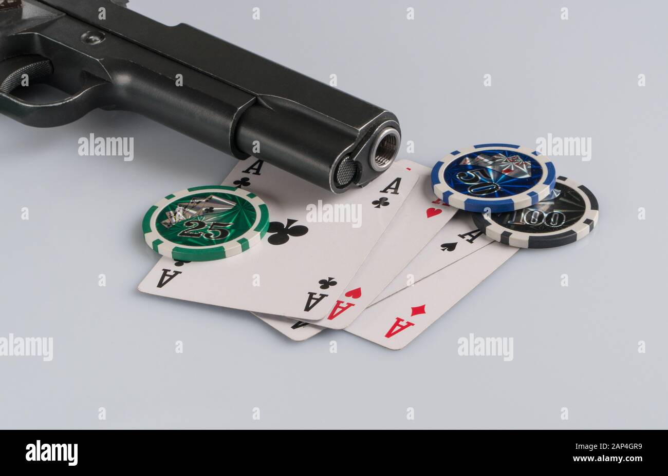 Gun playing cards hi-res stock photography and images - Alamy